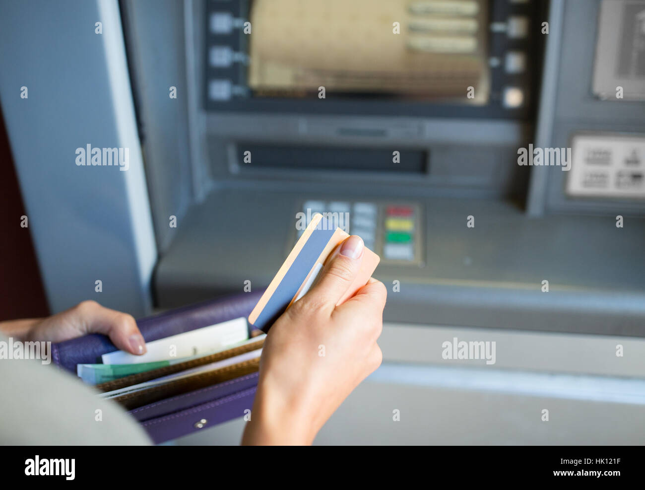 hands with money and credit card at atm machine Stock Photo - Alamy