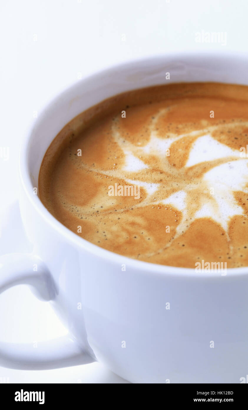 Cup of latte with froth art Stock Photo - Alamy