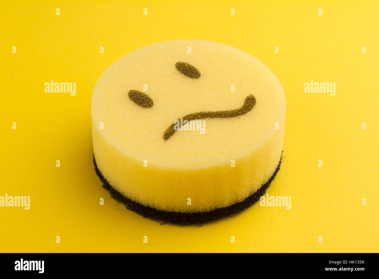 dish washing concept yellow sponge with sad scared face Stock Photo - Alamy