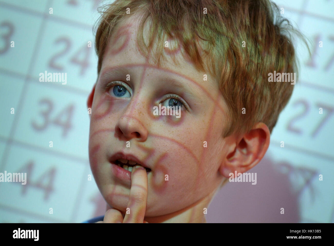 Primary School students using computers and in a mathematics lesson ...