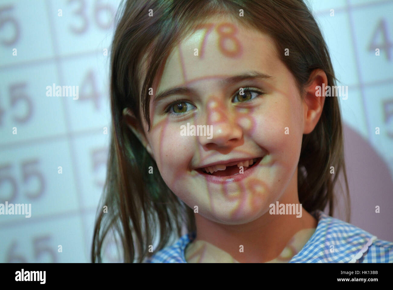 Primary School students using computers and in a mathematics lesson ...