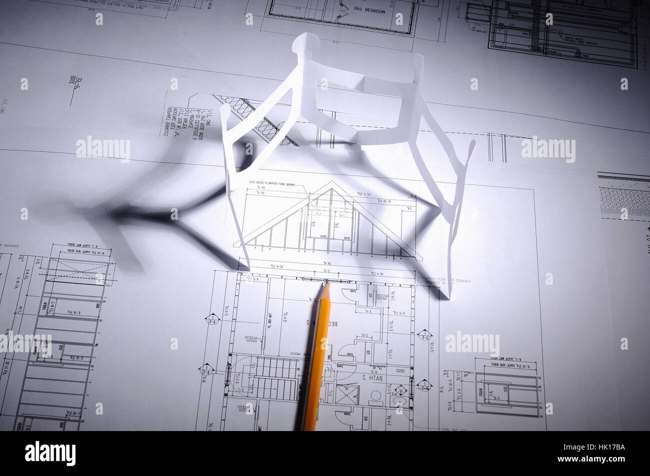 drawings of building and small paper manikins Stock Photo - Alamy