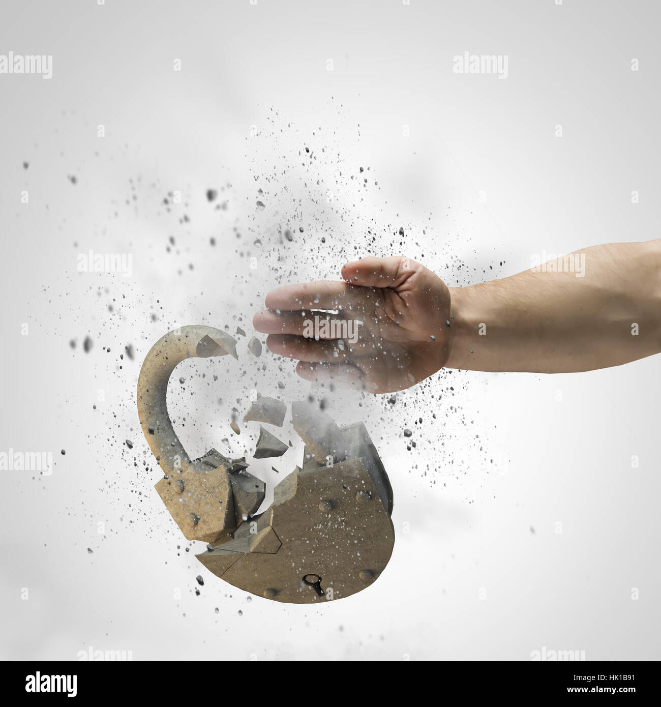 Image of human hand breaking stone lock hi-res stock photography and ...
