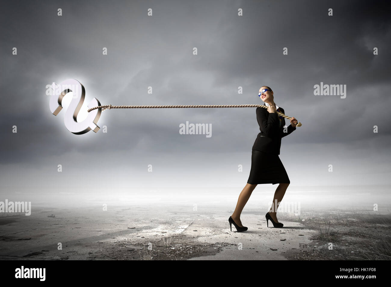 Female hand pulling rope hi-res stock photography and images - Alamy