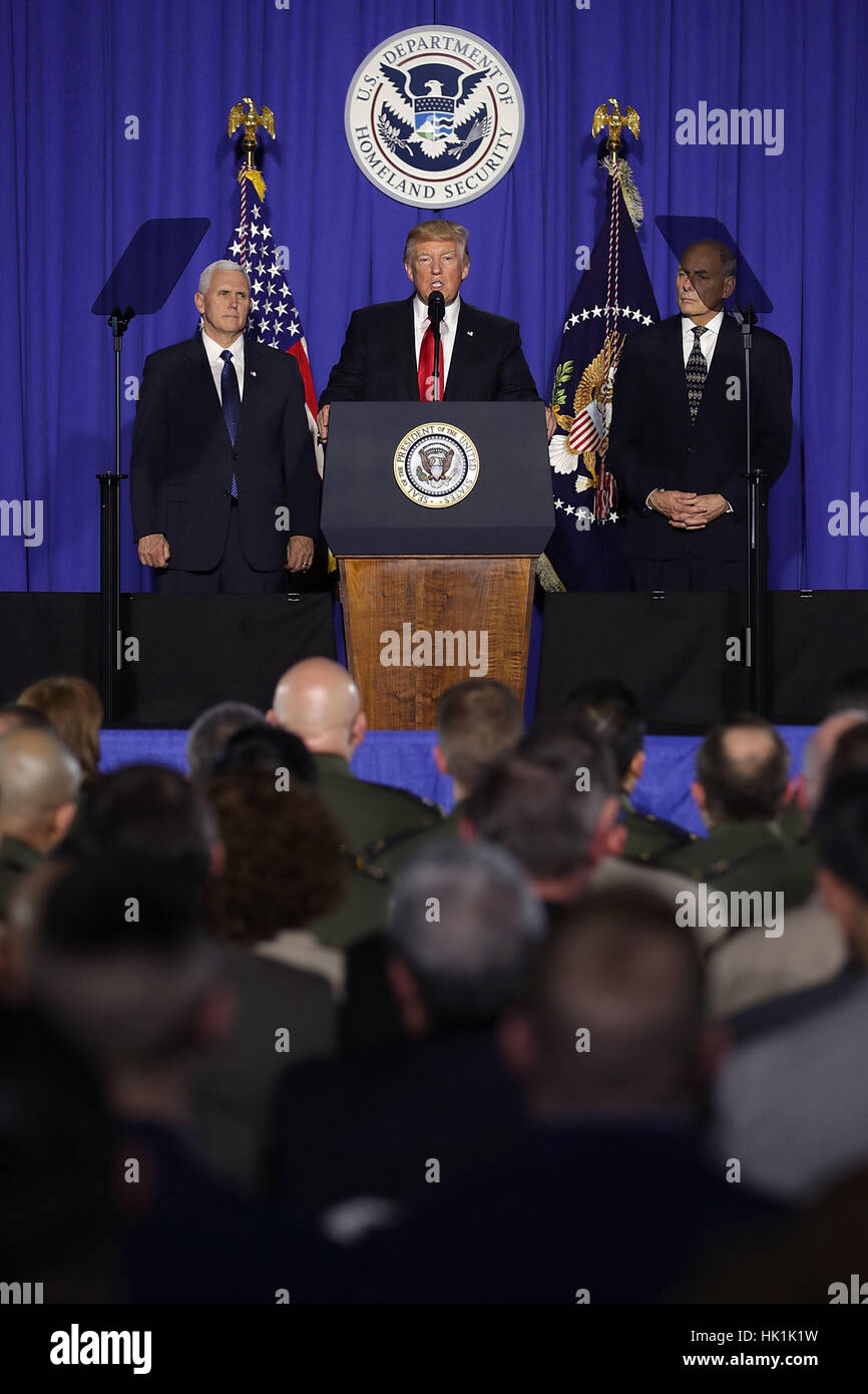 United States President Donald Trump (C) delivers remarks during a ...