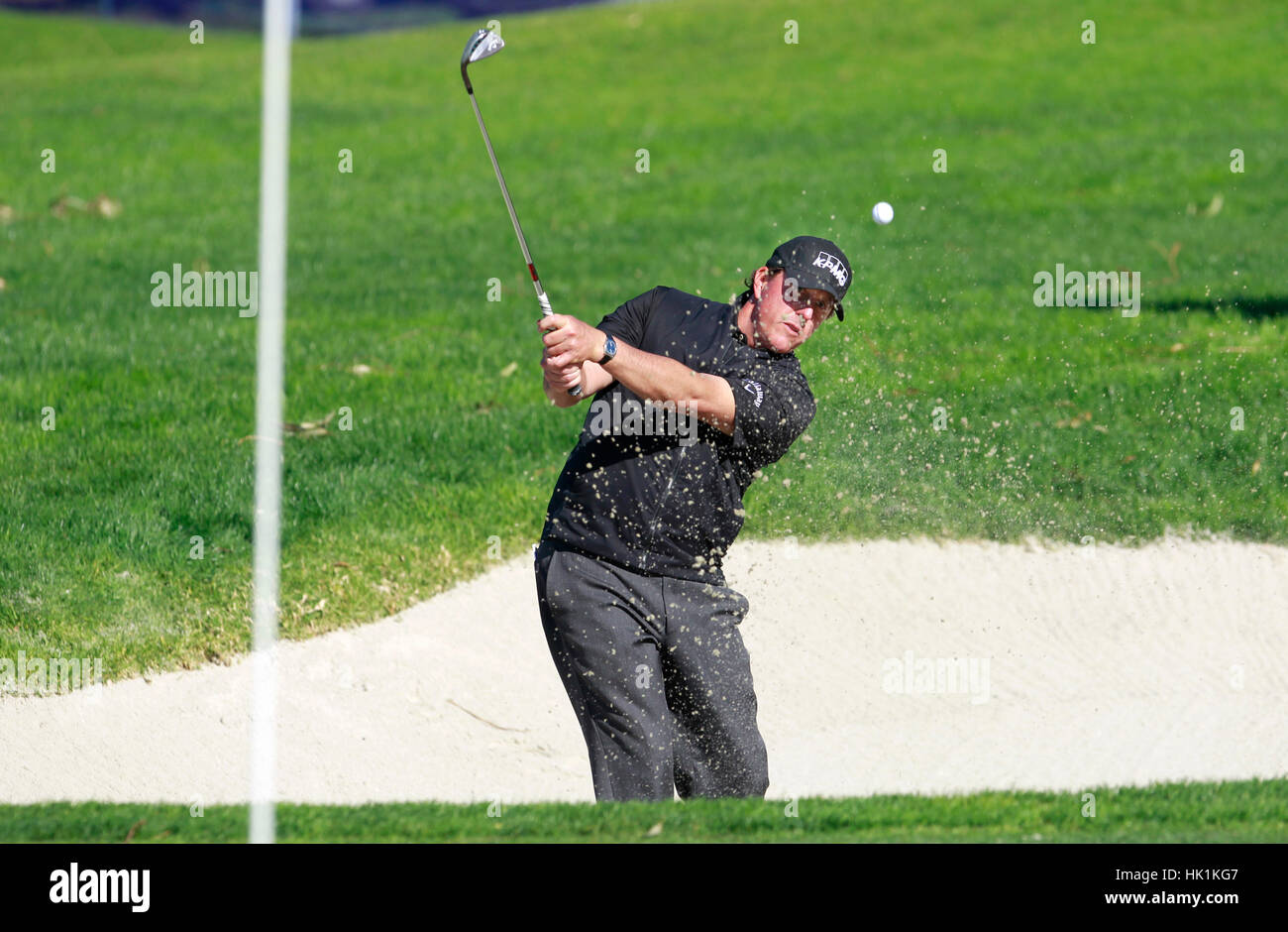 San Diego, USA. 25th Jan, 2017. Phil Mickelson hits ou of the sand on ...