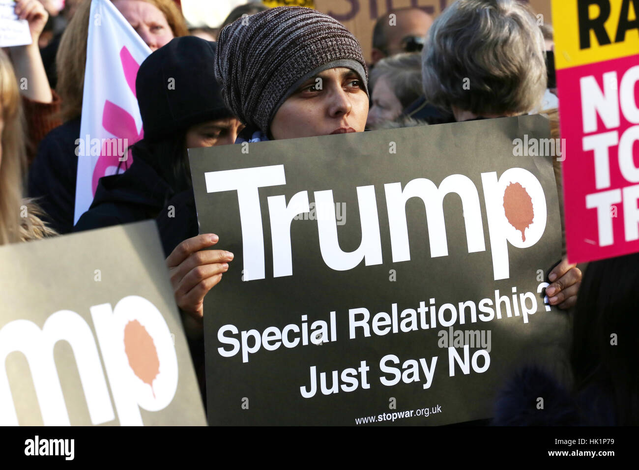 Manchester, UK. 4th February, 2017. A protester holding a trump placard ...
