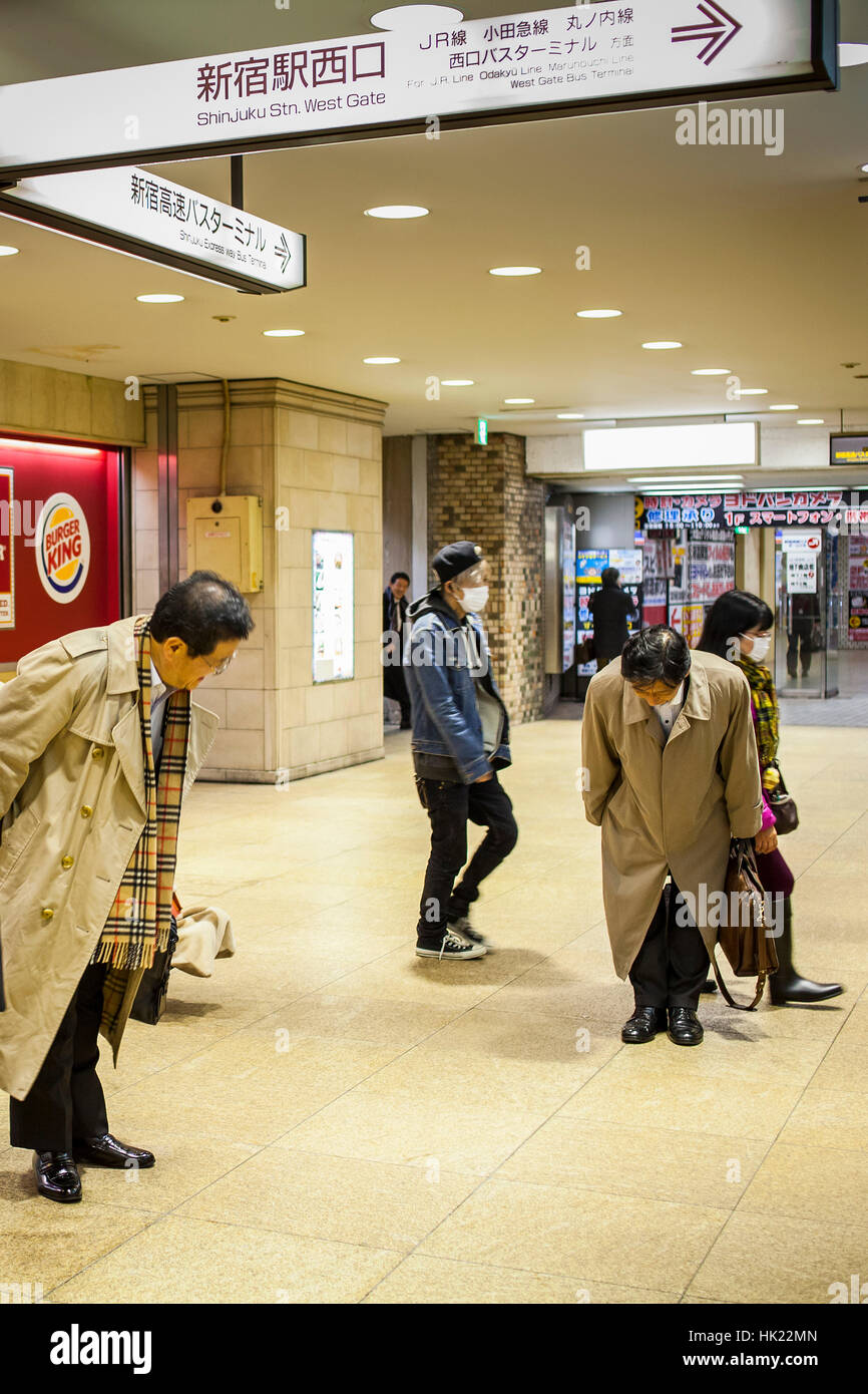 Greeting, friends saying goodbye, at Shinjuku Railway station, Tokyo ...