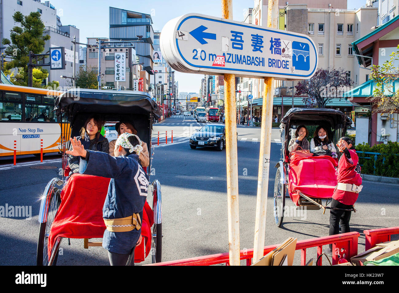 Tourists taking a Rickshaw ride, Asakusa, Tokyo, Japan Stock Photo - Alamy