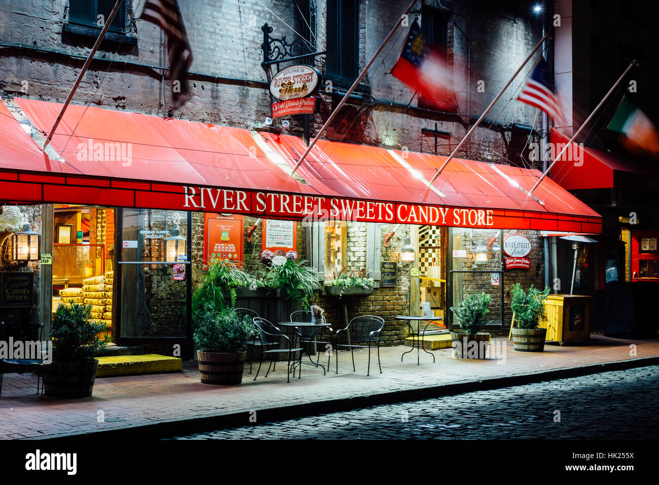 Candy store on River Street at night, in Savannah, Georgia Stock Photo ...