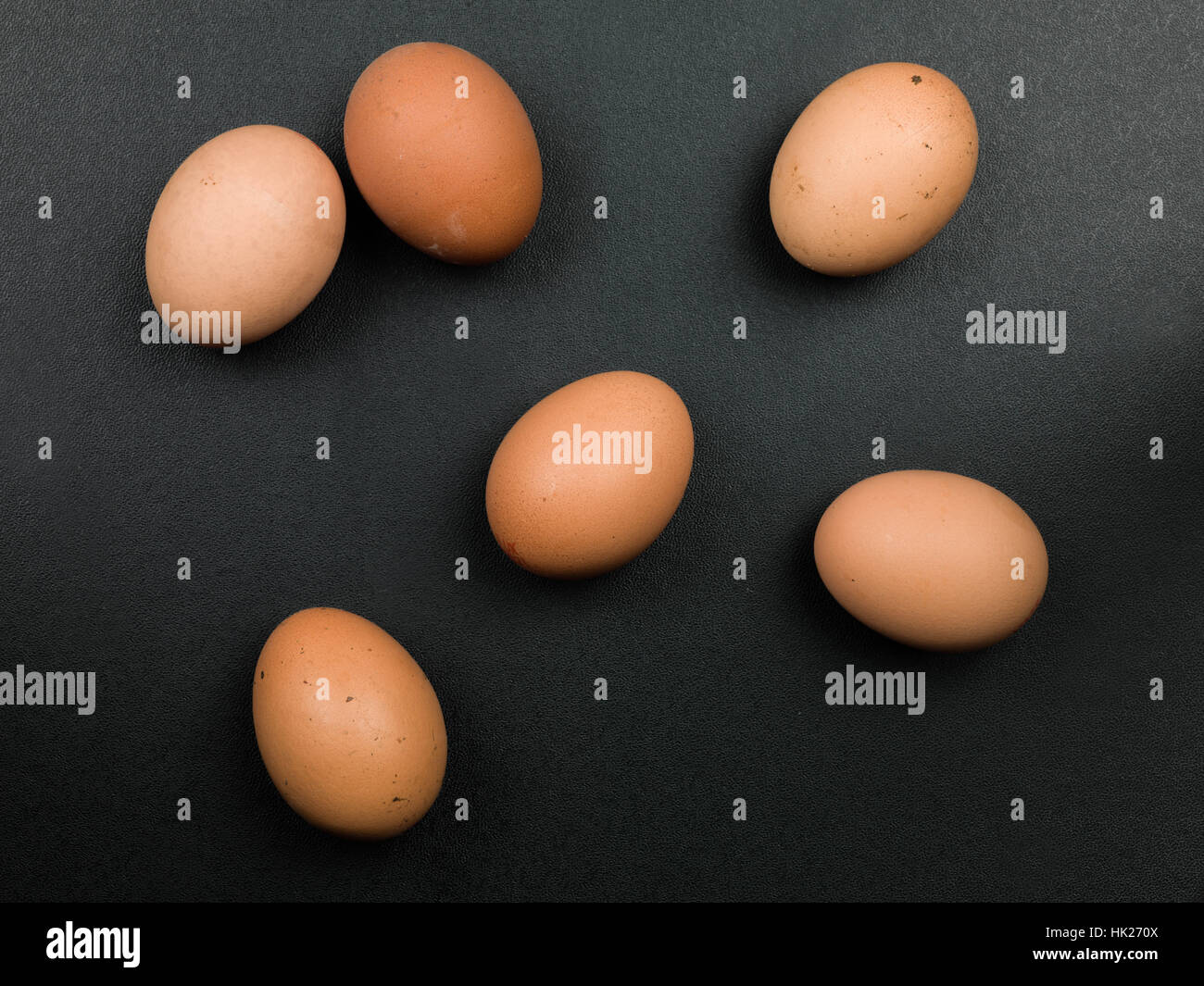 Six Fresh Uncooked Brown Eggs Stock Photo - Alamy