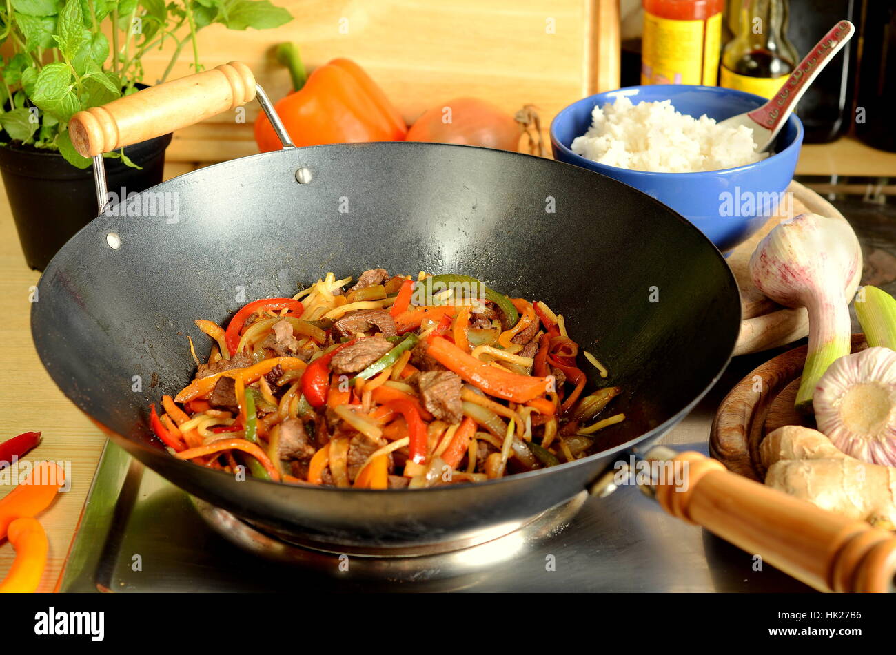 asian cooking in a wok Stock Photo - Alamy
