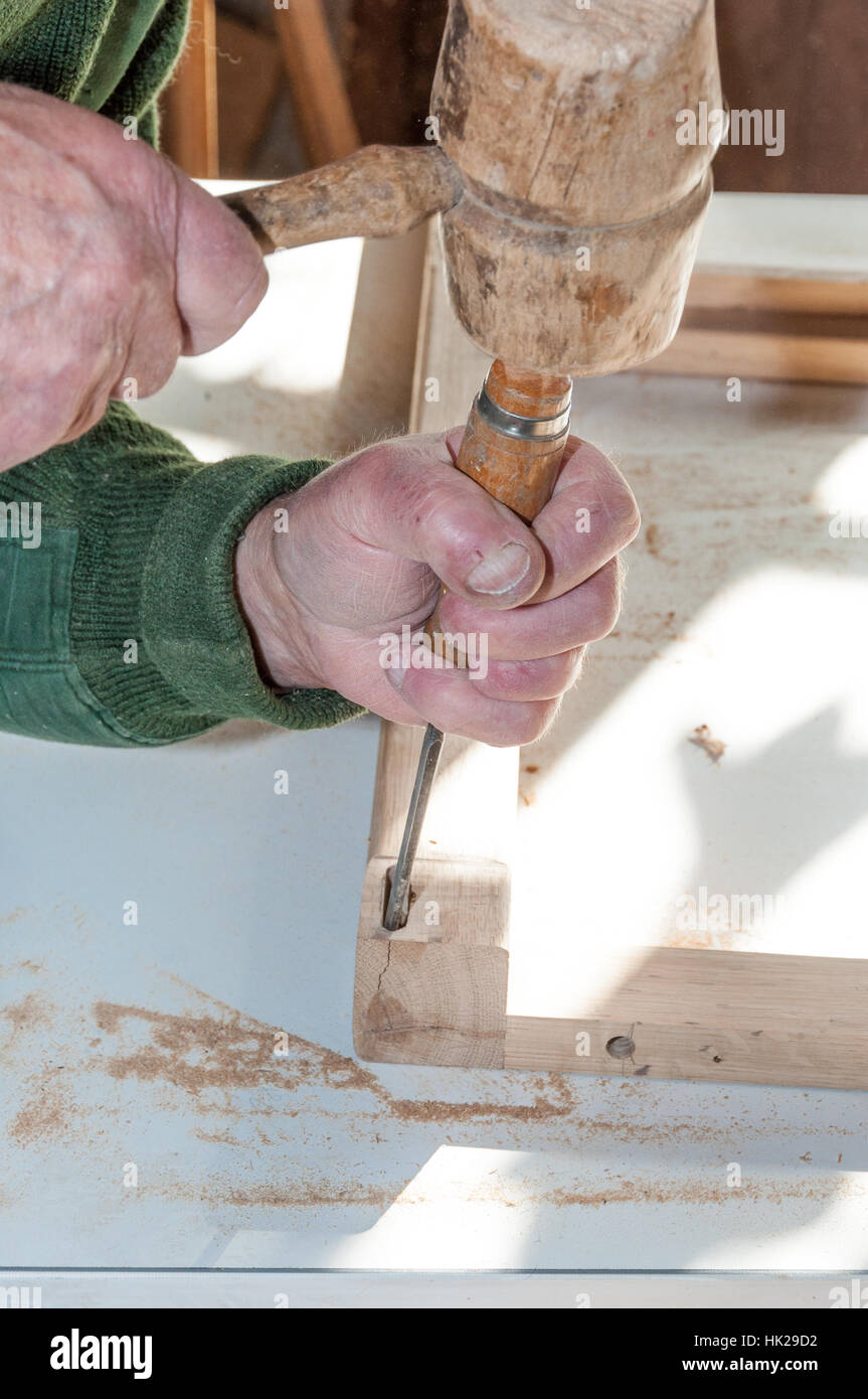 Carpenter's hands working wood in his workshop Stock Photo - Alamy