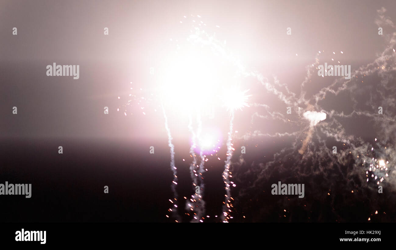 powerful fireworks in the night sky Stock Photo - Alamy