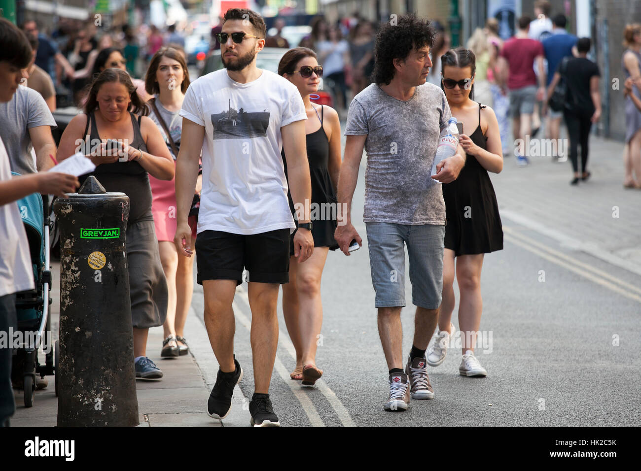 LONDON, ENGLAND - JULY 12, 2016 hipster men dressed in cool Londoner ...