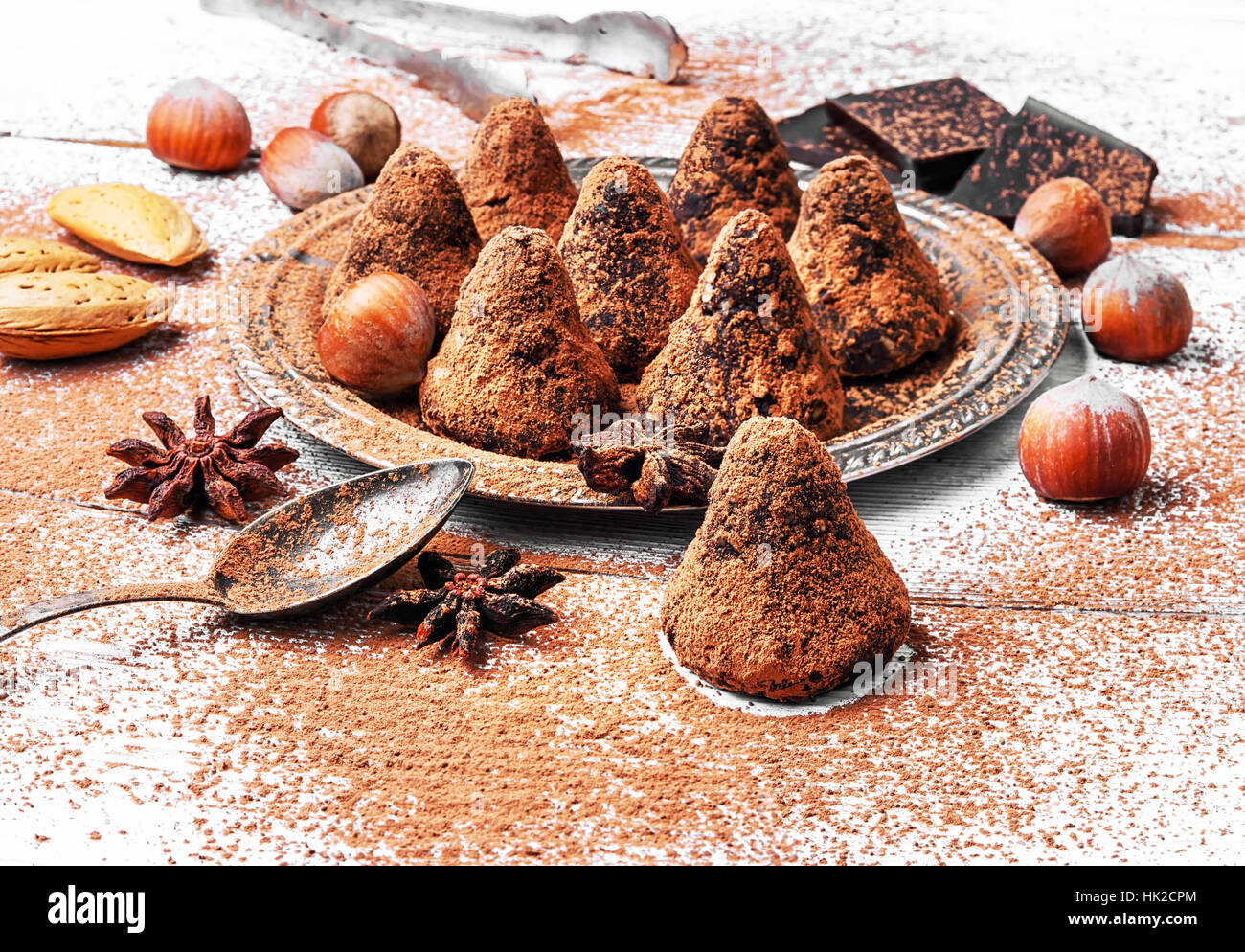 Chocolate truffles candies with cocoa powder and nuts Stock Photo - Alamy