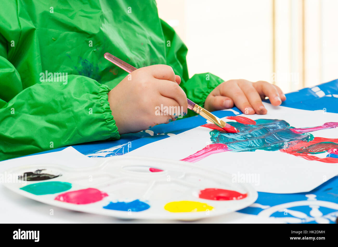 Hand of child painting with brush Stock Photo - Alamy