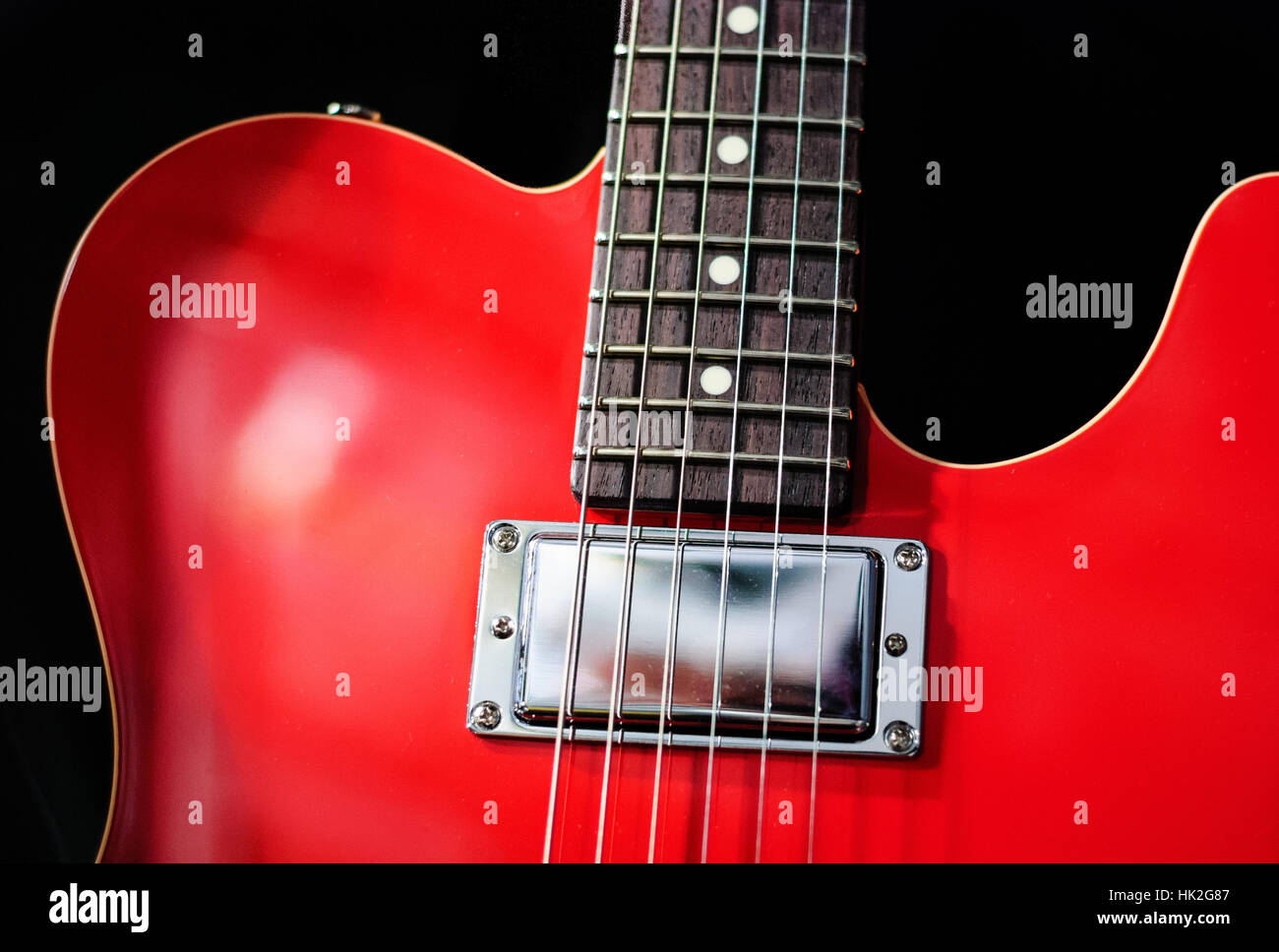 red rock guitar Stock Photo - Alamy