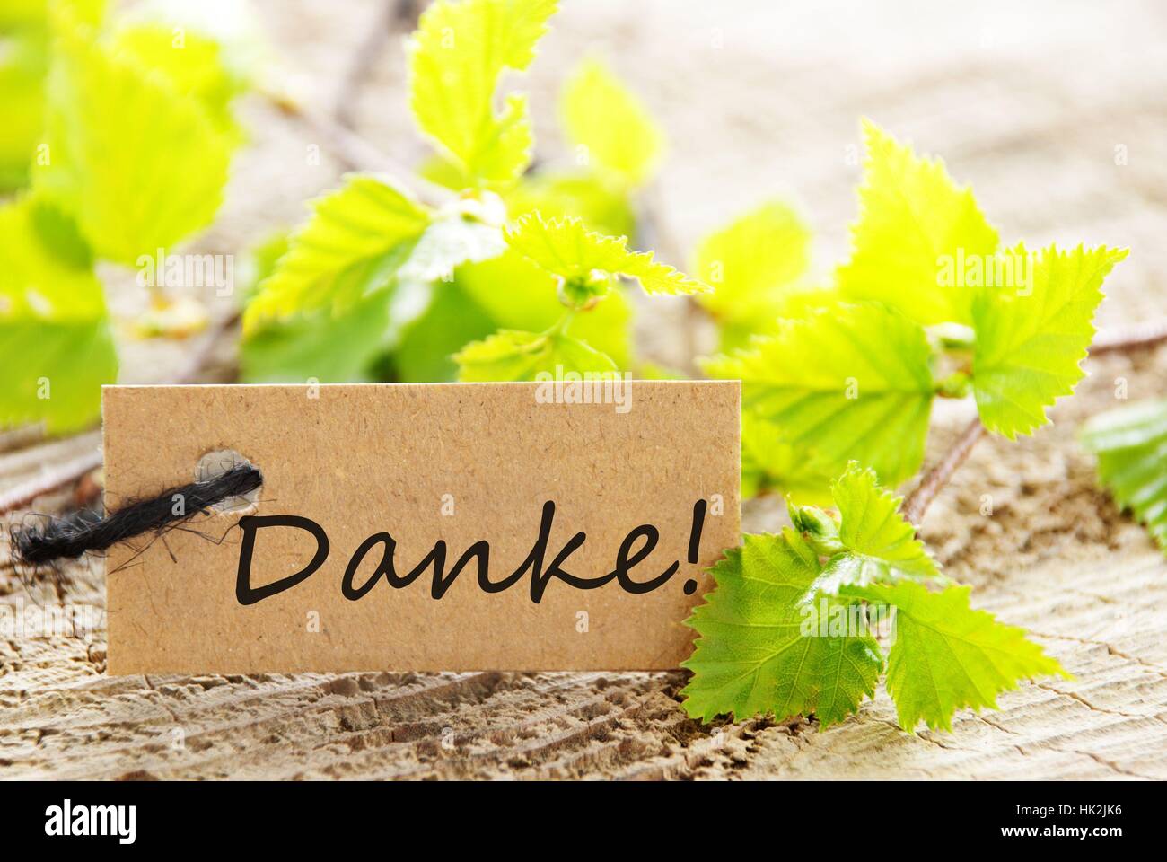 a natural looking label with the german word Danke, which means thanks ...