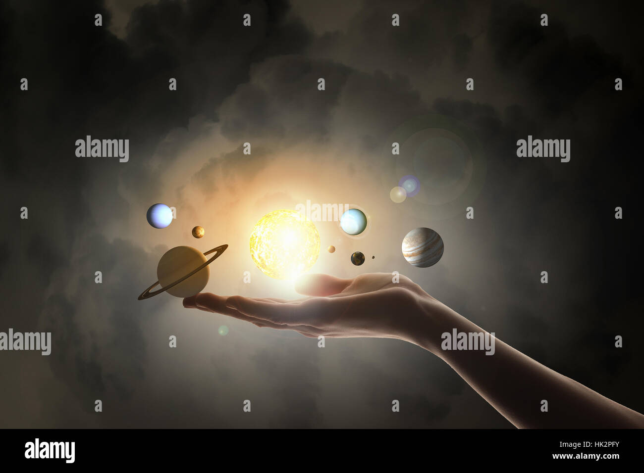 Close up of planet sun system in your hand Stock Photo - Alamy