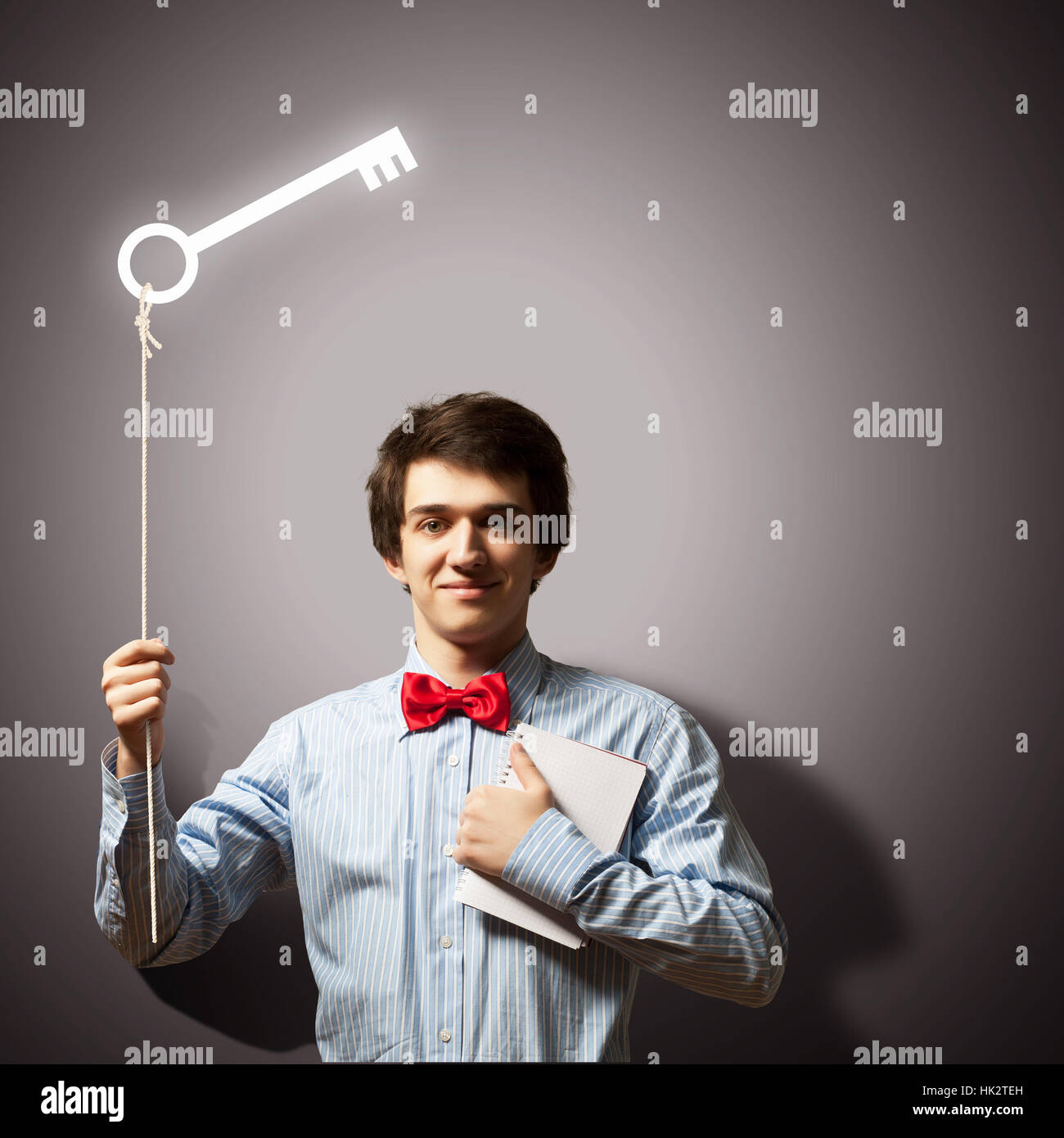Handsome intelligent man holding hi-res stock photography and images ...
