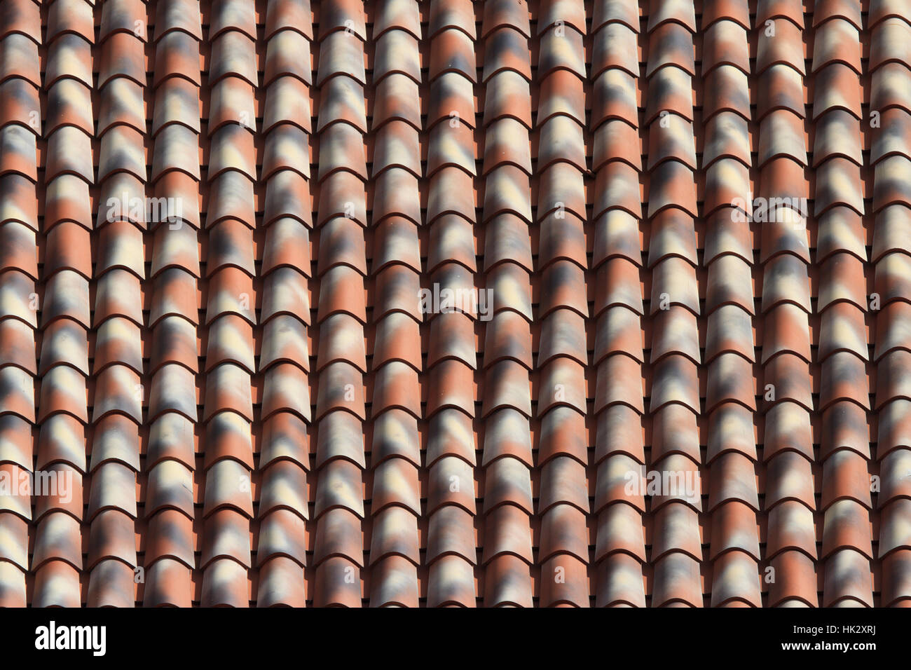 Texture of striped ceramic tile roof close up. background horizontal ...