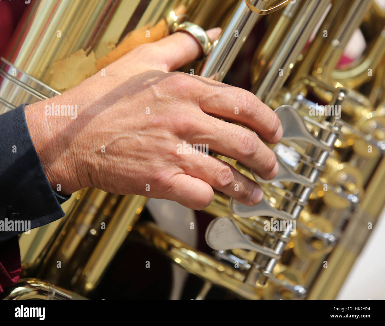 hand of player and the golden saxophone Stock Photo - Alamy