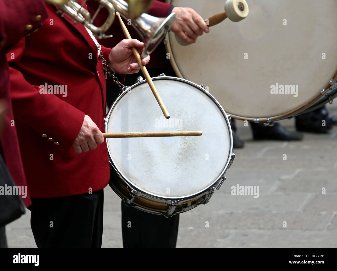 player plays the drum in the band outside Stock Photo - Alamy