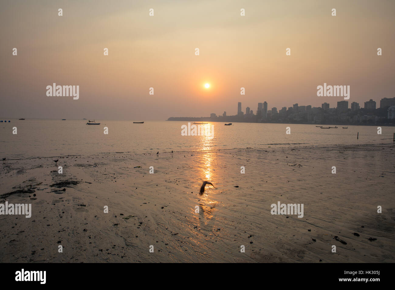 Sunset over Chowpaty Beach in Mumbai (Bombay), the city's most iconic ...