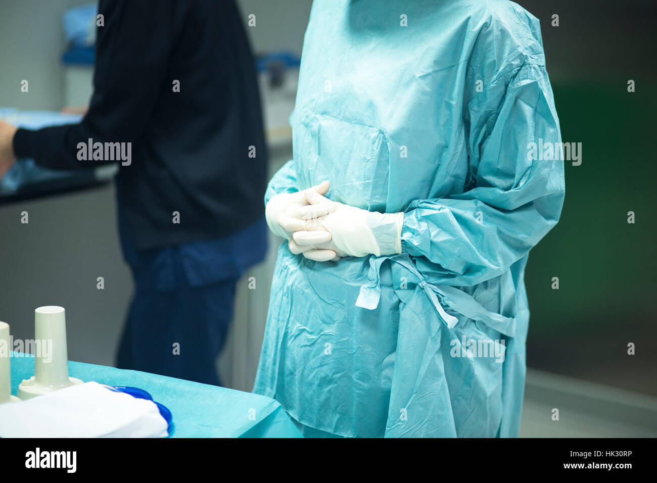 Surgeon in hospital surgery in sterile uniform "scrubs" in operating ...