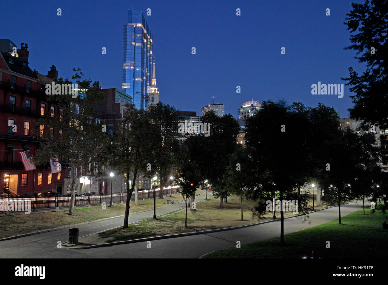 General view across Boston Common at night towards Park Street Church ...