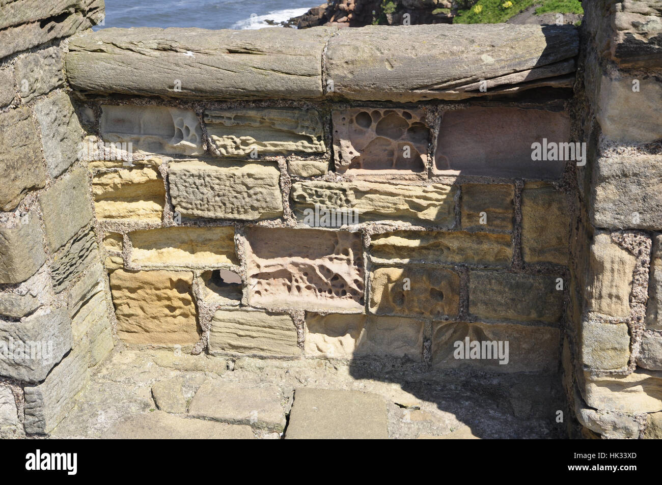 Stone wall bay Stock Photo - Alamy