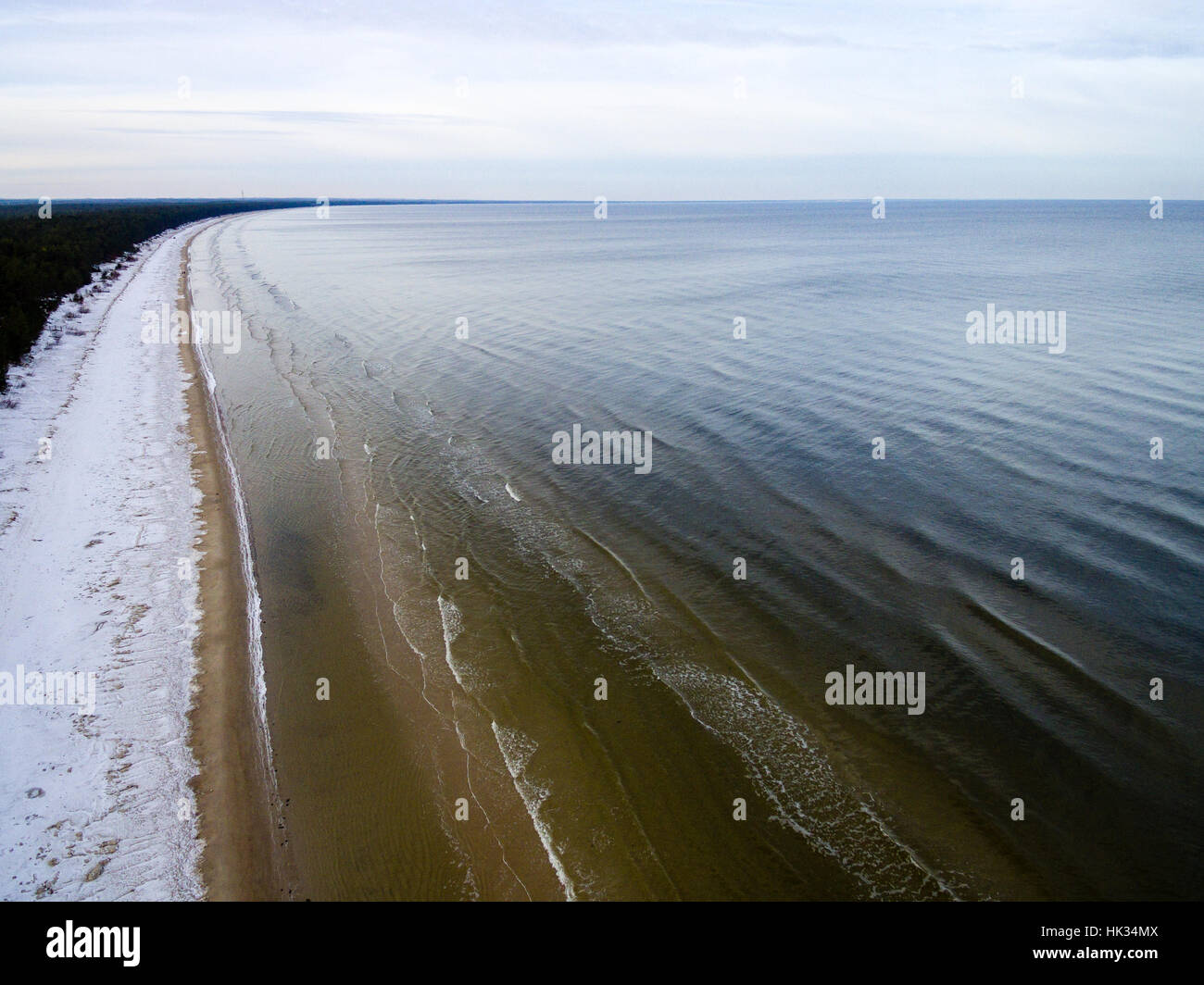 aerial view of frozen beach in winter. drone photography. sea with ...