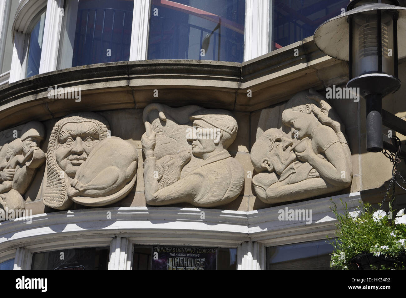 Stone carved faces Stock Photo - Alamy