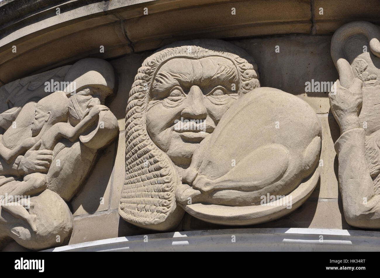 Stone carved faces Stock Photo - Alamy