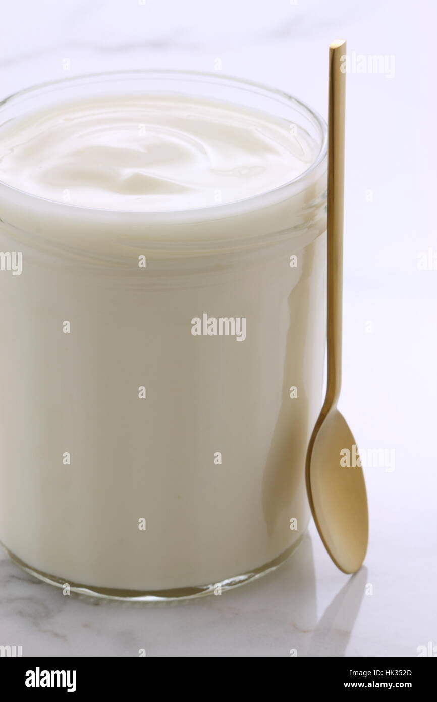 Delicious, nutritious and healthy fresh plain yogurt pot. On vintage ...