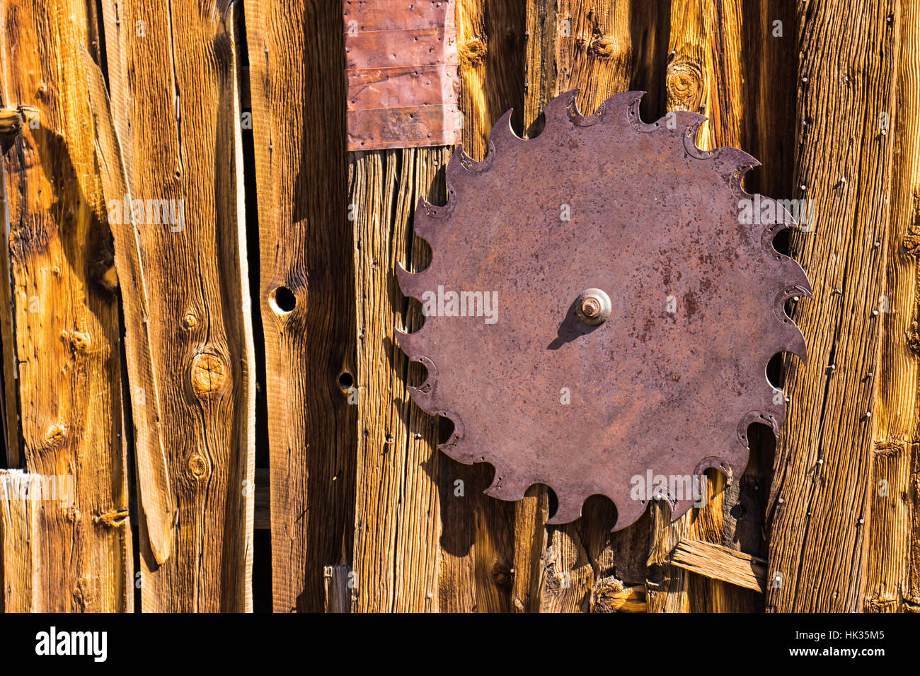 Vintage Iron Saw Blade On Side of 1800's Building In California Ghost ...