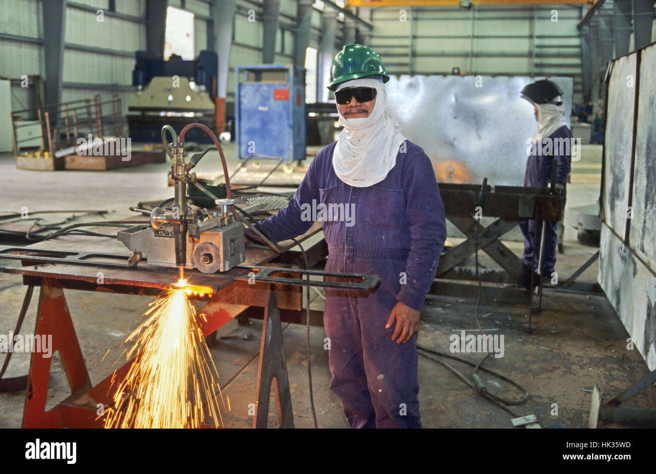 Dock workers in Freeport, Bahamas Stock Photo - Alamy