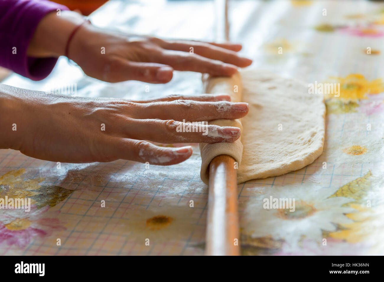 Hand rolling dough roller hi-res stock photography and images - Alamy