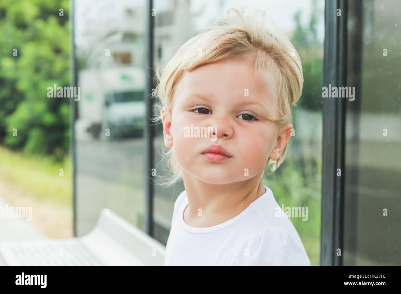 Girl alone at bus stop hi-res stock photography and images - Alamy