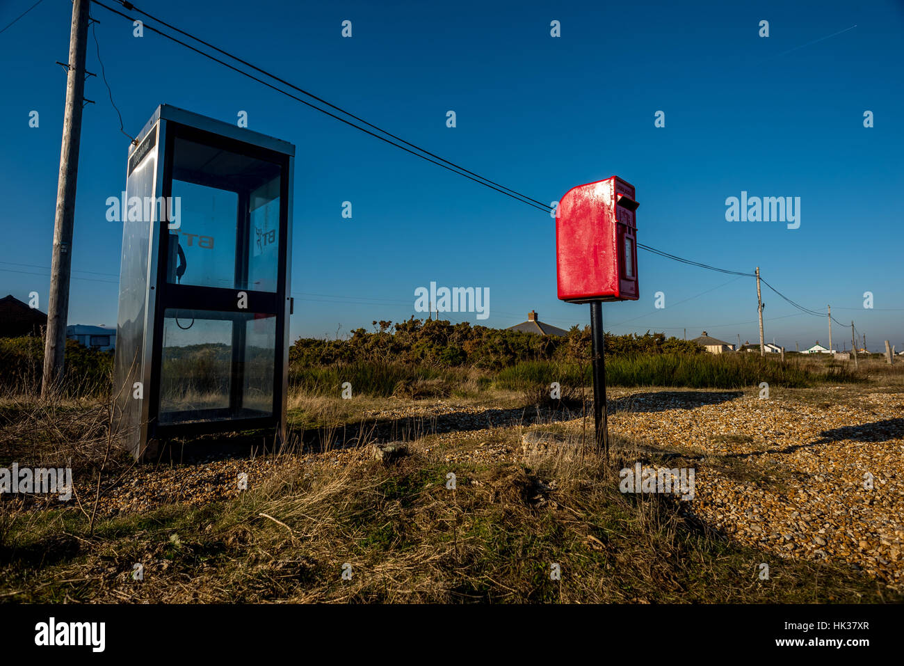 A telephone box and letter box on the beach at Dungeness Stock Photo ...
