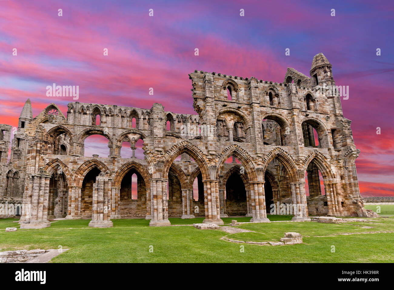 The ruins of Whitby Abbey England and beautiful sunset sky Stock Photo ...