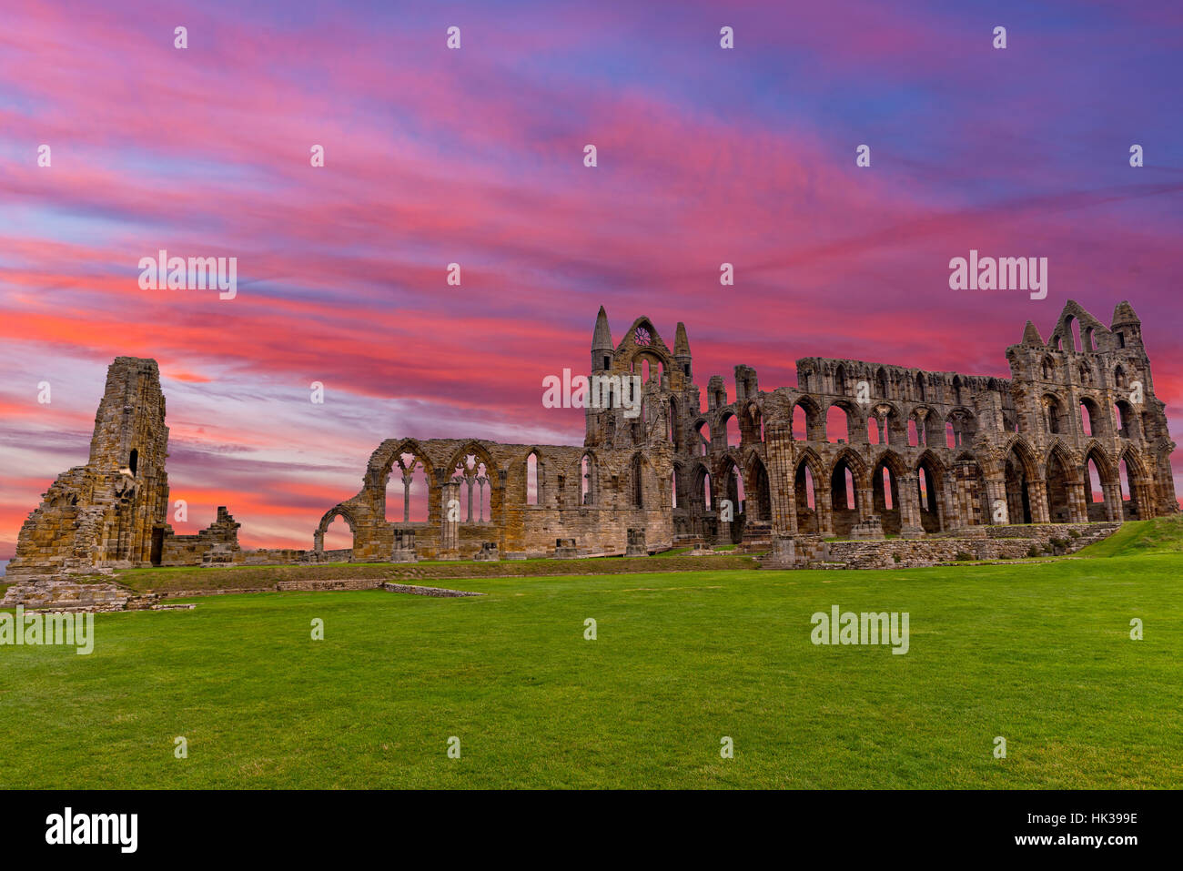 The ruins of Whitby Abbey England and beautiful sunset sky Stock Photo ...