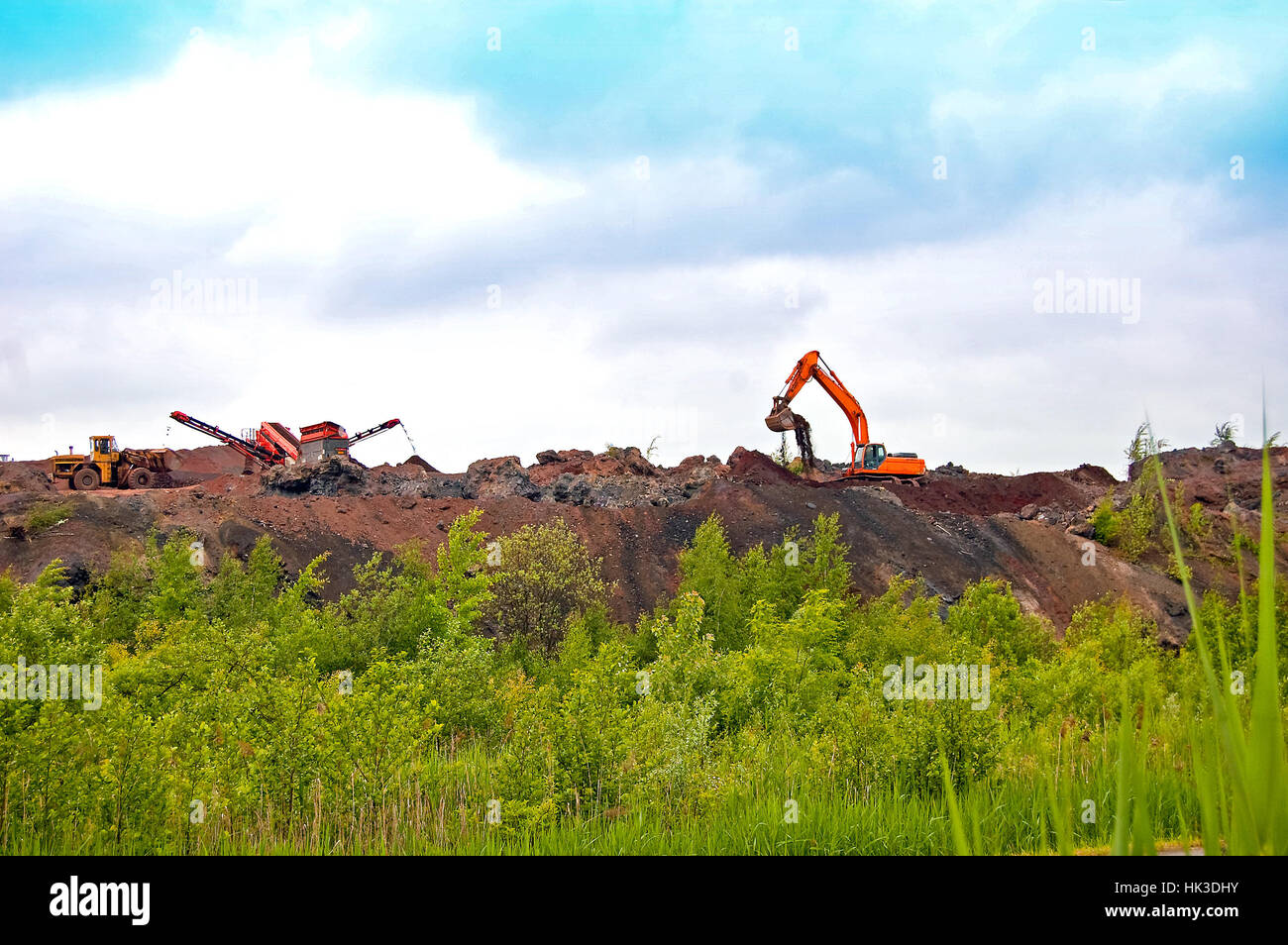 operating heavy machinery digging Stock Photo - Alamy