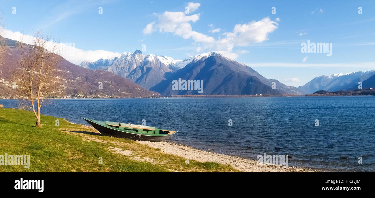 Lake of Como, Italy. Panorama of the lake and mountains from the beach ...