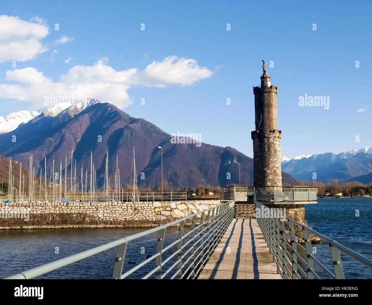 Lake of Como, Italy. Port of Gera Lario. Harbor entrance with Madonna ...
