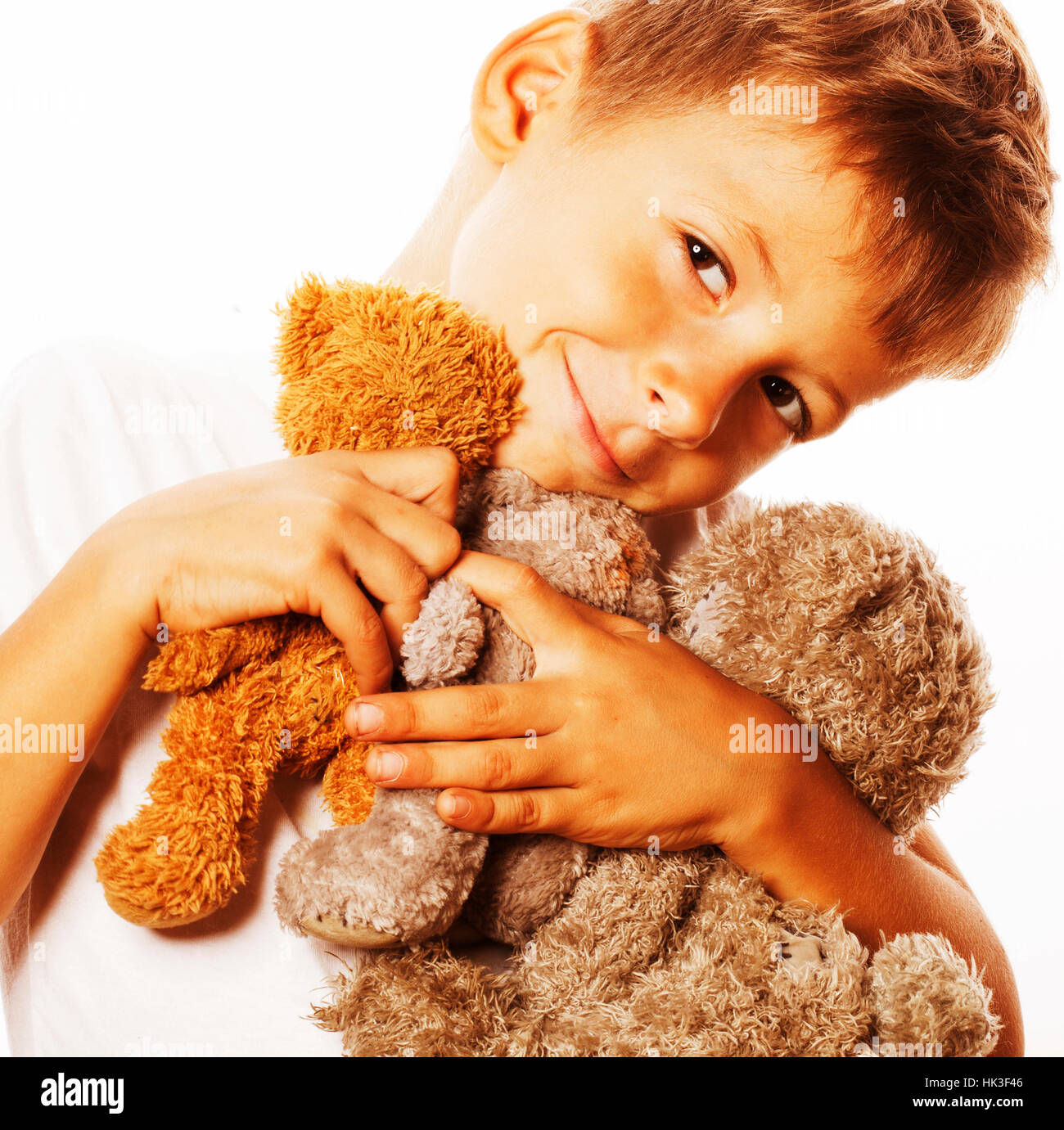 little cute boy with many teddy bears hugging isolated close up Stock ...