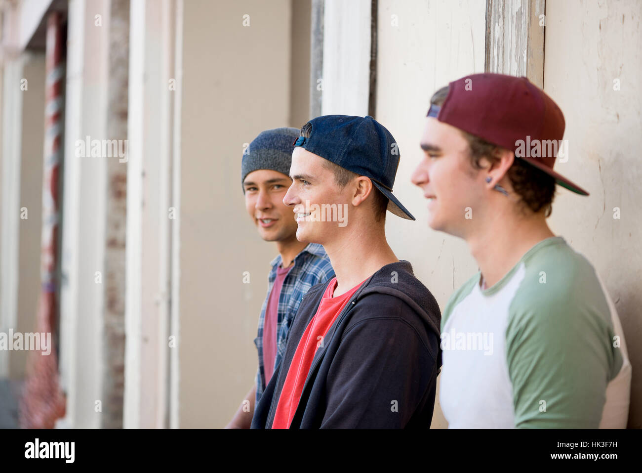Three guys walking together in hi-res stock photography and images - Alamy