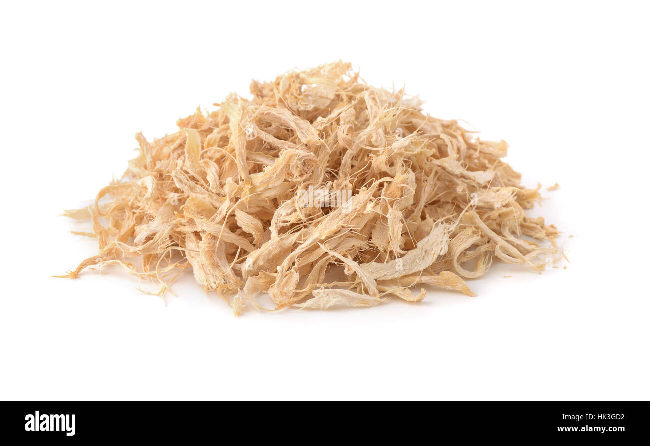 Pile of shredded dry ginger isolated on white Stock Photo - Alamy