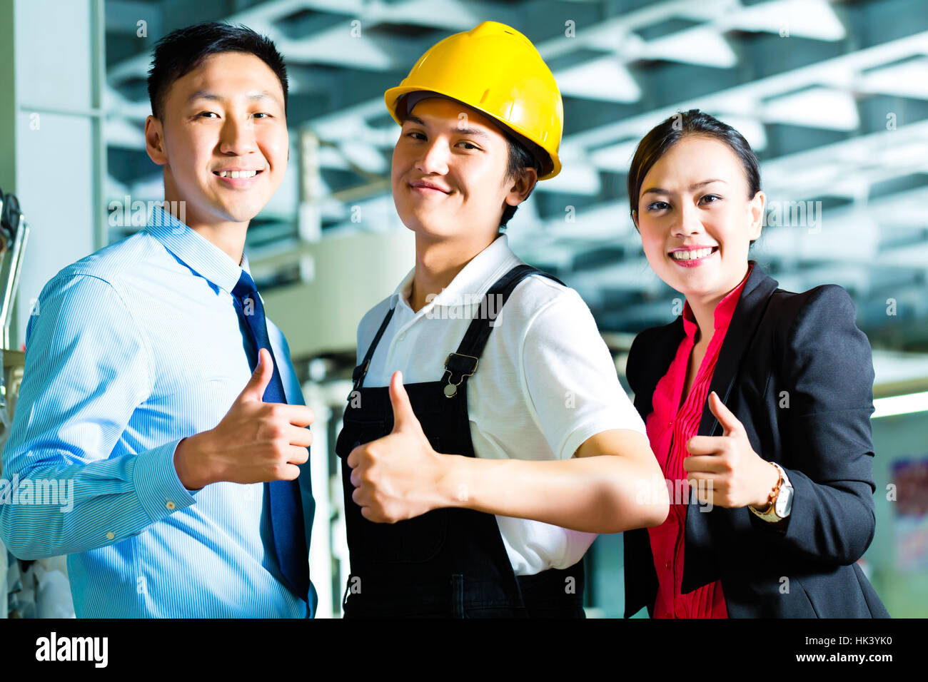 workers,production manager and owner in factory Stock Photo - Alamy